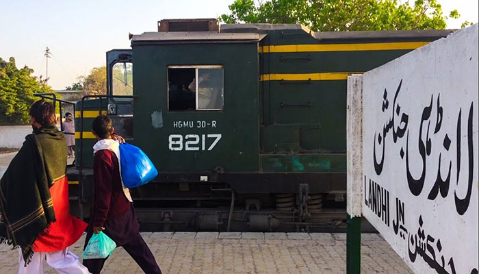 Train runs over man, three sons