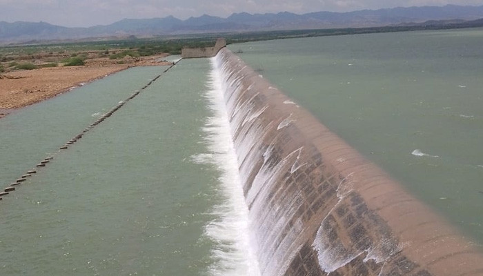 Water from spillway starts overflowing as Hub Dam fills to capacity