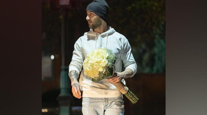 Iran rapper jailed over backing protests freed on bail