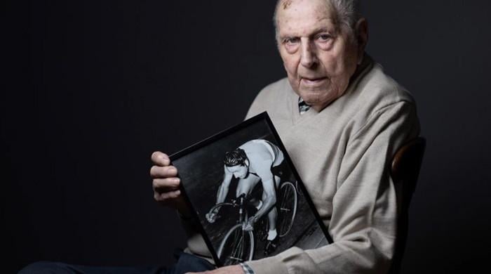 Coste ‘proud’ to carry Olympic torch 76 years after winning gold