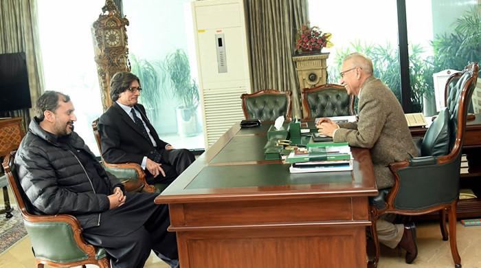 PTI team calls on Alvi