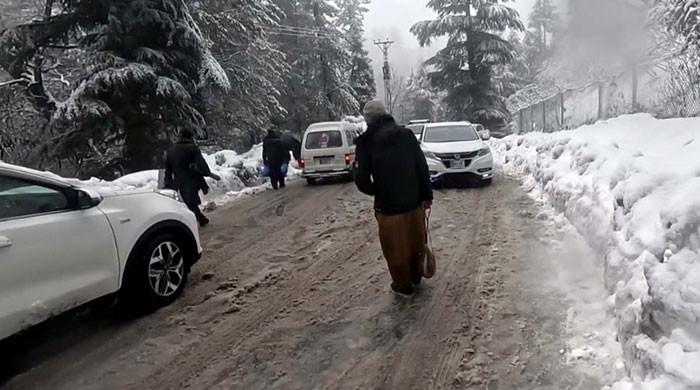 Abbottabad, surrounding areas grapple with heavy rain, snowfall