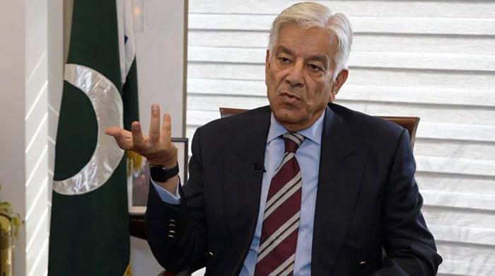 Asif says he signed files to remove Afghan nationals from Pak Army