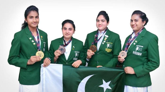 Medal winning sisters honoured
