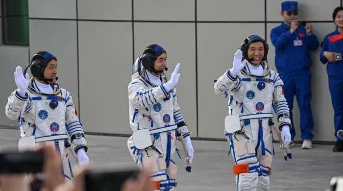 Chinese space station crew returns after six months in orbit
