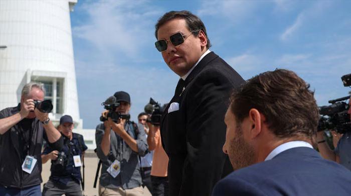 Disgraced US ex-congressman Santos jailed for seven years for fraud