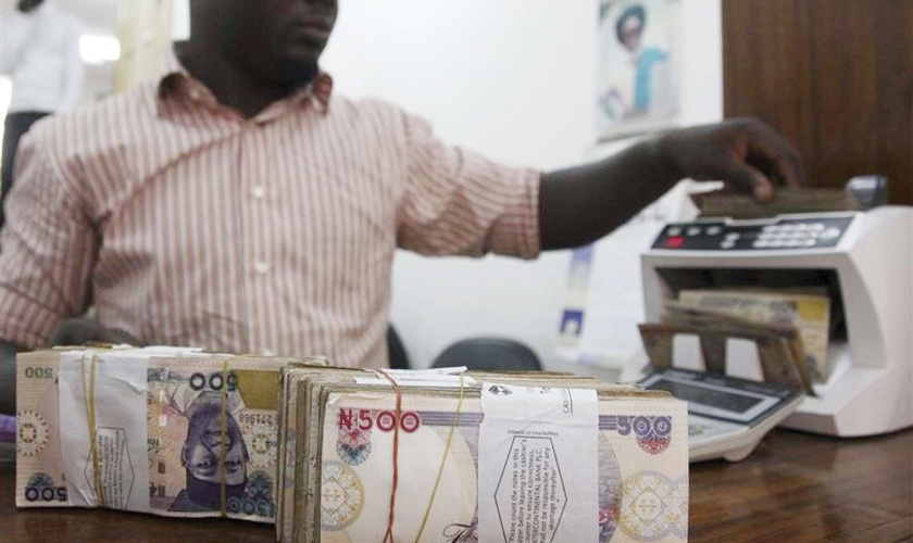 Nigeria changes course with painful devaluation