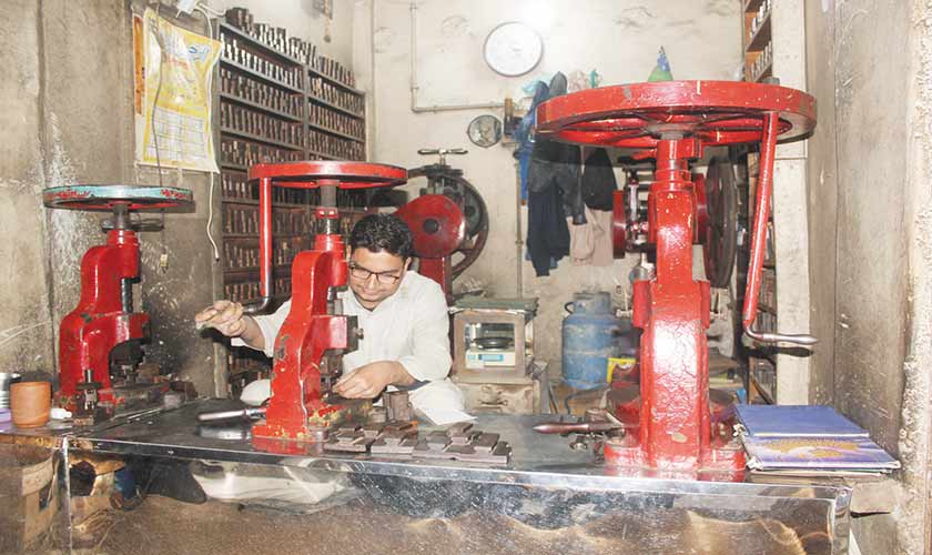 Sweeping Sarafa Bazaar