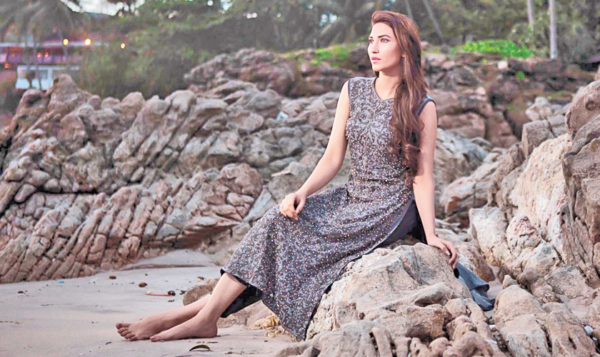 DESIGNING HER OWN STYLE