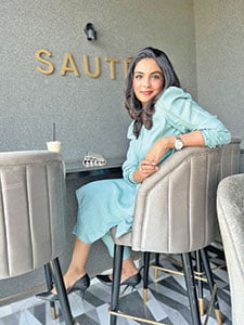 DESIGNING HER OWN STYLE